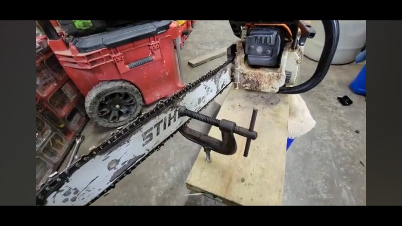 chainsaw bar vise: an easy way to hold your saw while sharpening. - YouTube