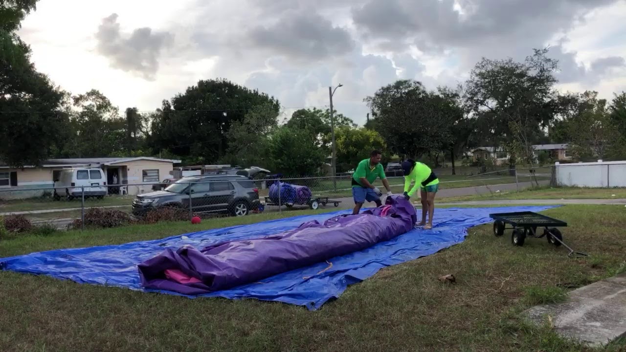 Roll up the bounce house combo - YouTube