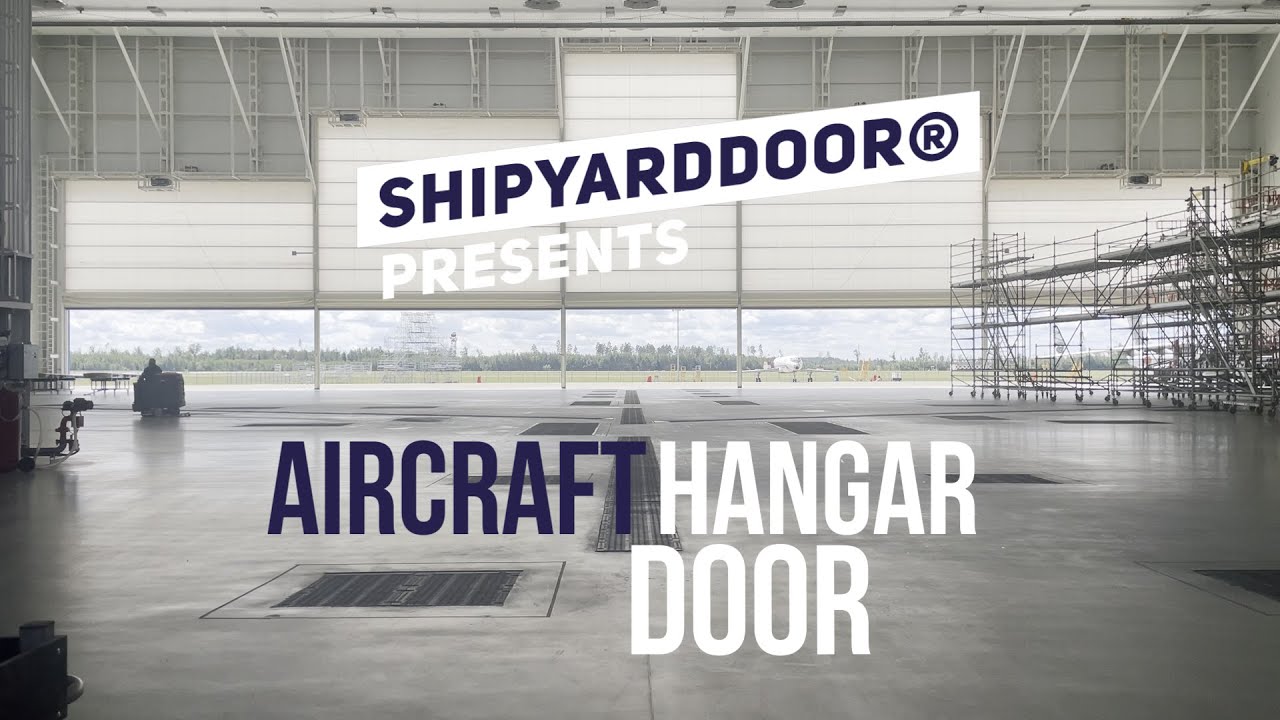 Aircraft Hangar Door with Foldable Mullions | Shipyarddoor's Massive ...