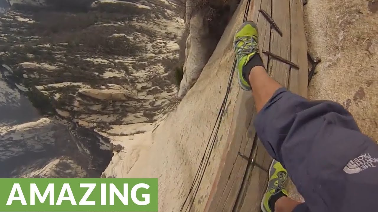 Walking along the World's most dangerous cliffside trail - YouTube