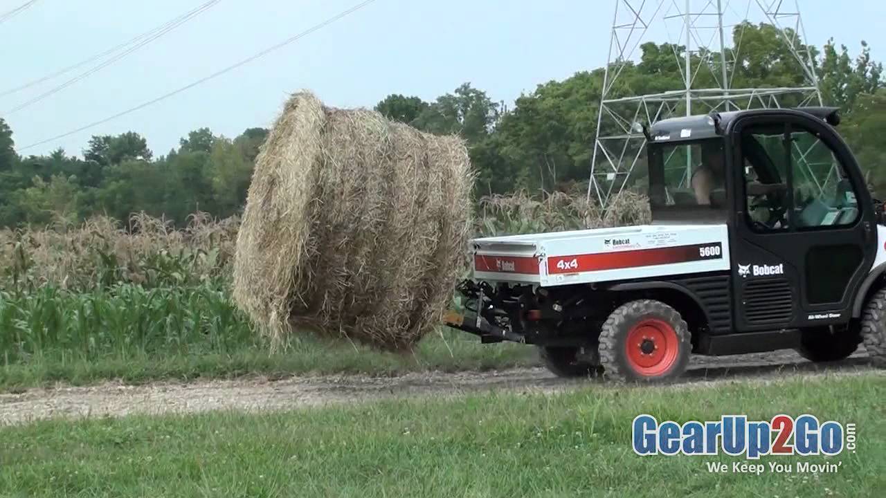 UTV Hitchworks - Farmboy HD lifting round bale on rear of Bobcat ...