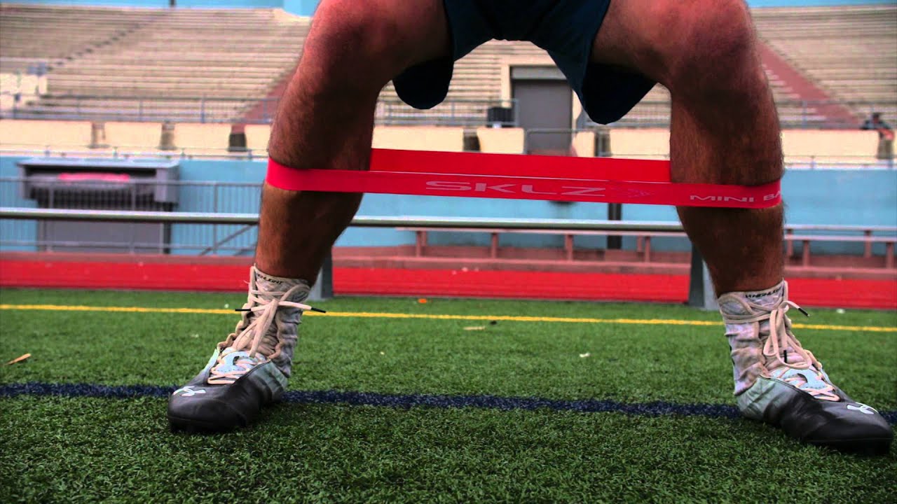 Resisted Side Steps | CoachUp Football Training - YouTube