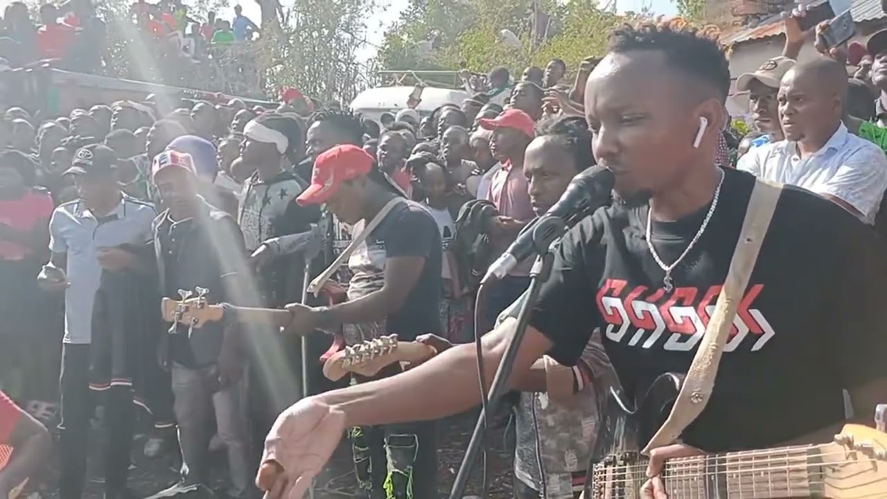 Katombi plays a tribute song during mukuu burial 100s of people fall ...