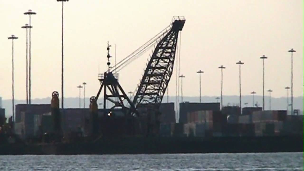 Clamshell Dredge 54 at work - YouTube
