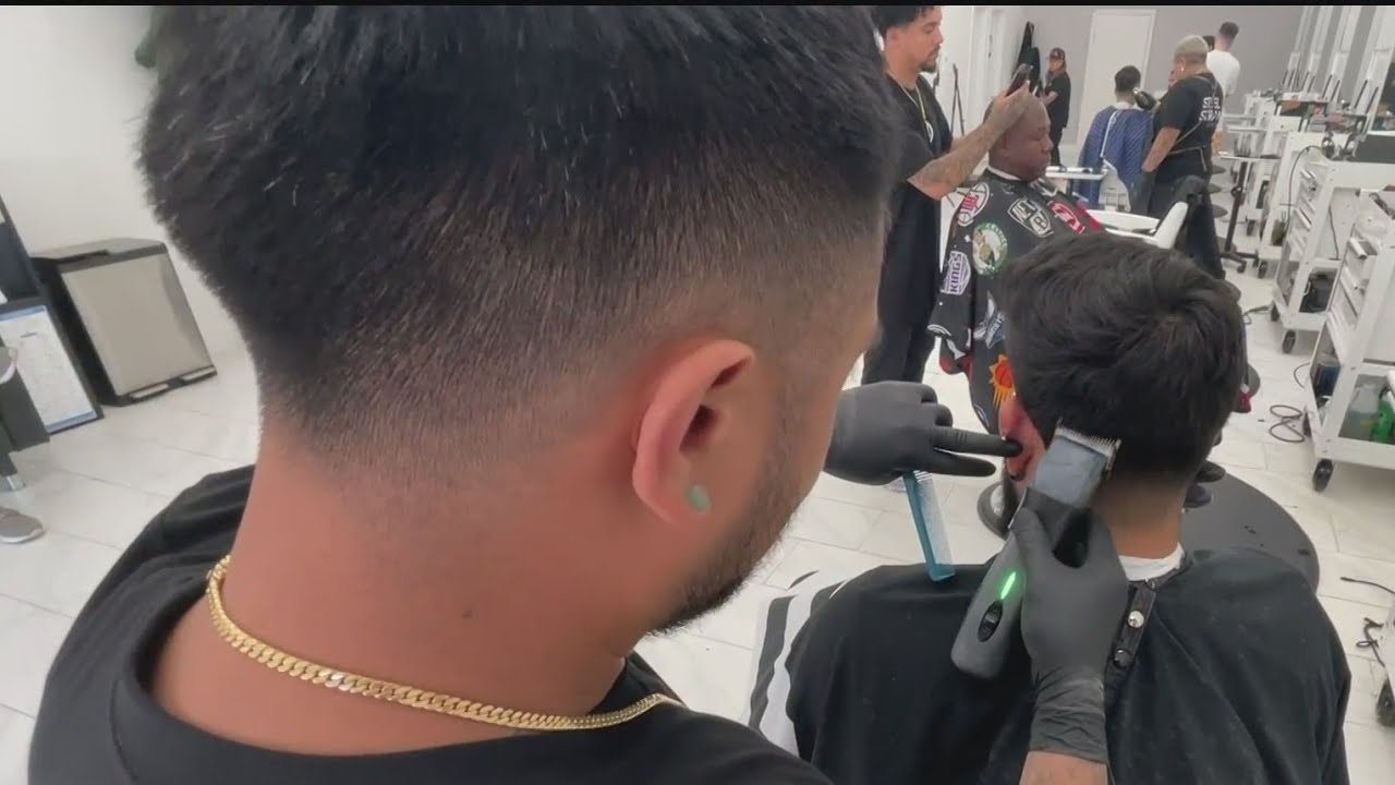 Mission barber begins slow recovery from pandemic closure - YouTube