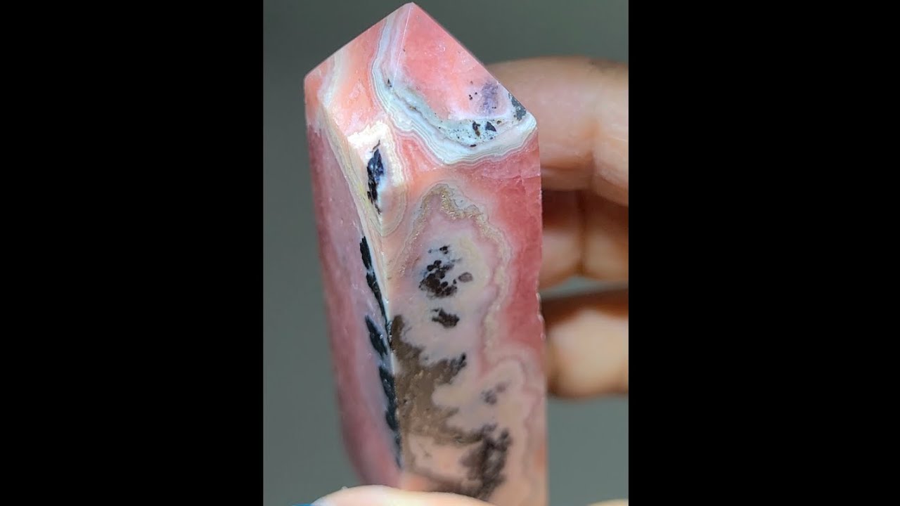 Rhodochrosite tower with black manganese oxides and beautiful banding ...