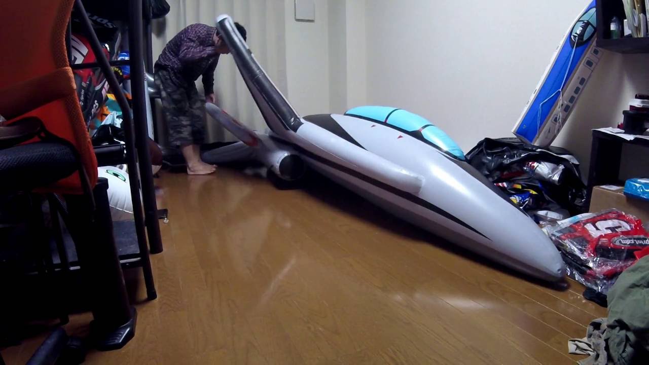 Riding on my inflatable jet fighter - YouTube