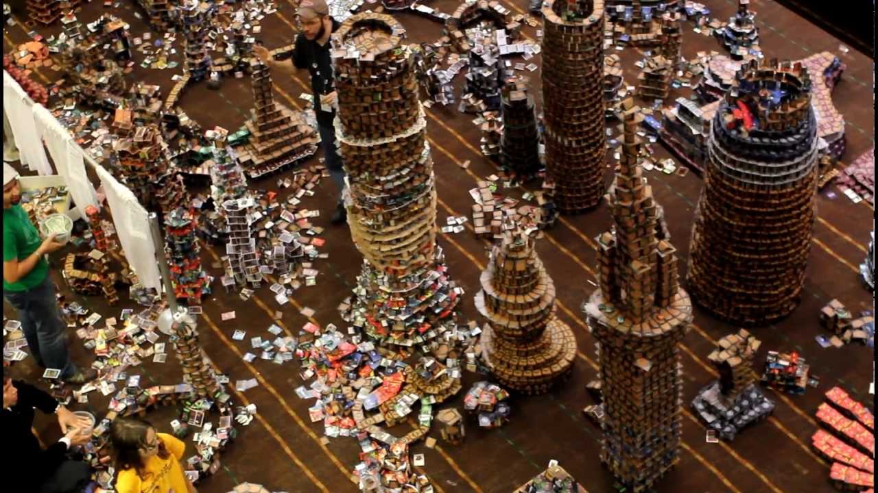 Girl knocks down giant card tower on first try - Cardhalla @ GenCon ...
