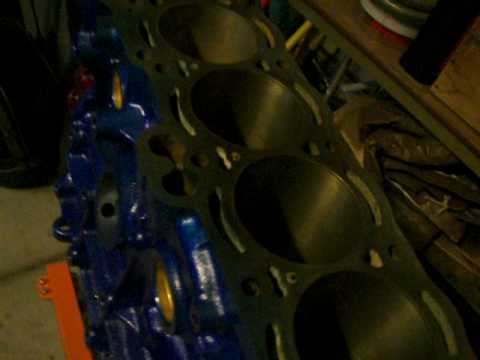 seven rib 4age preping block and checking main $ rod bearing oil ...