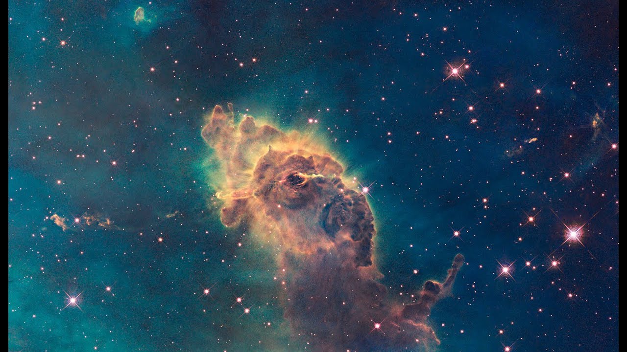 Touring the Cosmic Cliffs in the Carina Nebula - YouTube