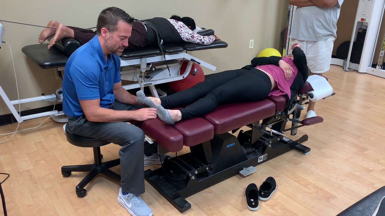 Foot adjustment for heel pain - YouTube