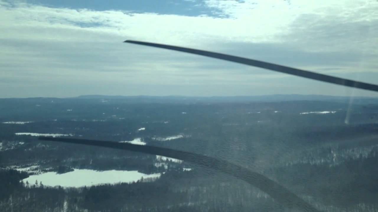 Landing on the ice runway at Alton Bay - YouTube