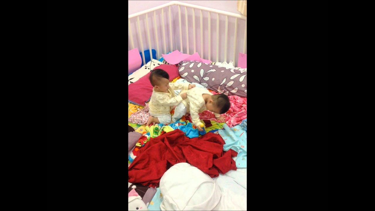 Twin babies fight so cute - YouTube