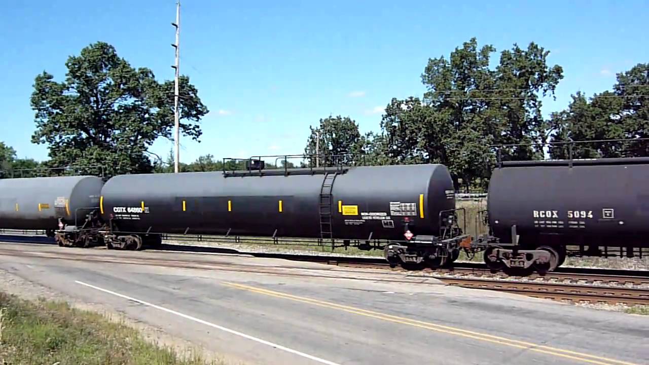 3 BNSF SD70MACs headed back west and TTX Depressed Flat Car. - YouTube