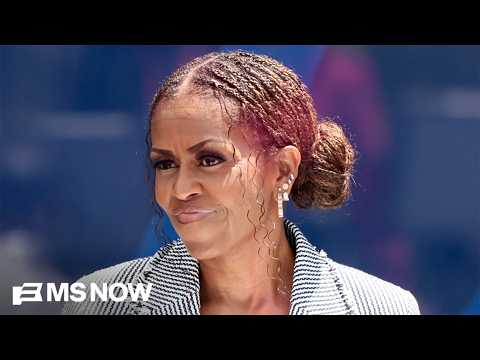 'You were doing the people's work...winning a peace prize': Michelle Obama honors husband