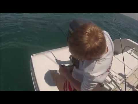 Kid hooks and catches BIG gag on bass pole!