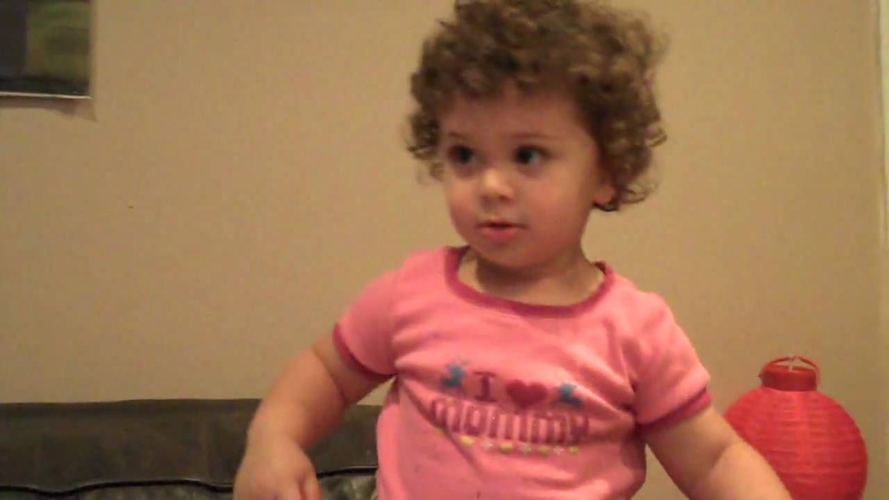 Ava watching Barney and jumping on the couch - YouTube