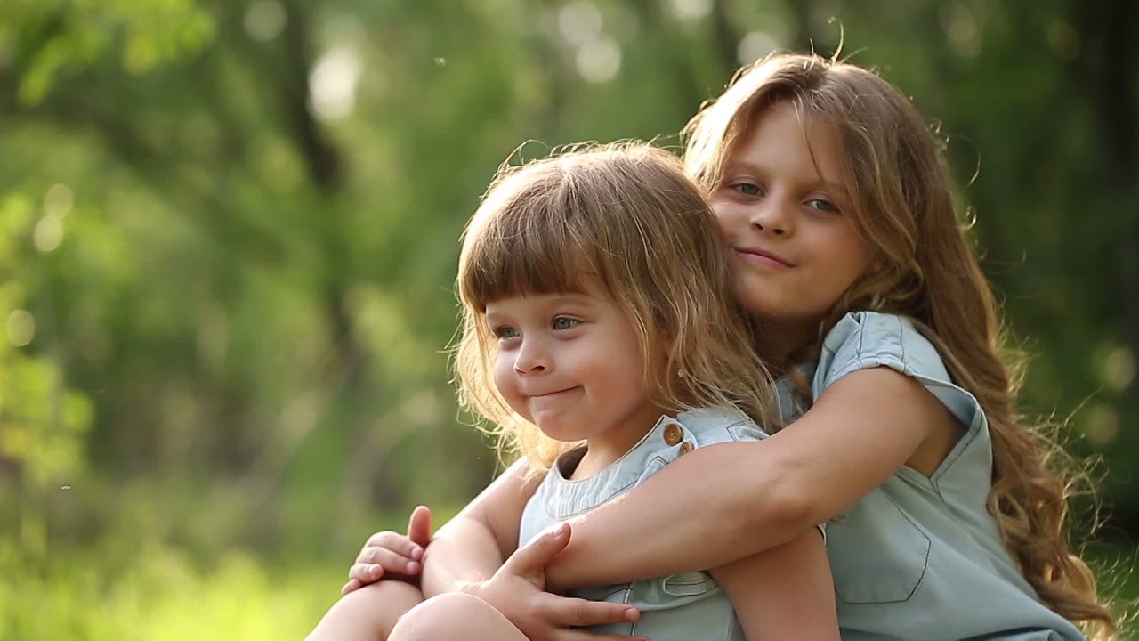 Two sisters embrace. Family time - YouTube