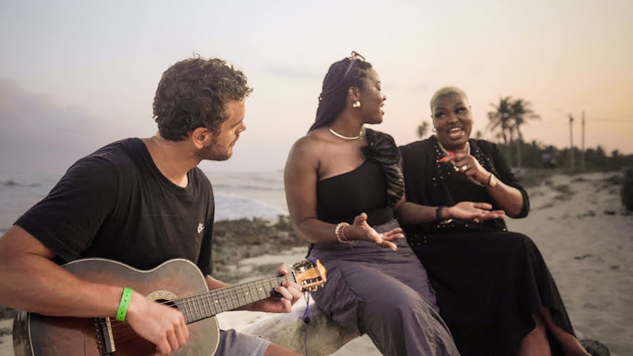 Mother and Daughter Sing Redemption Song on the Beach of San Andres ...