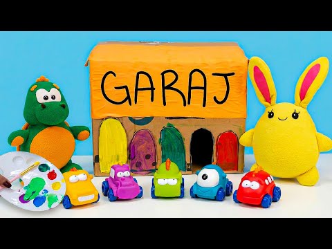 Lucky ve Nicola arabalarını park etmek için kutudan garaj yapıyor! Çocuklar için.