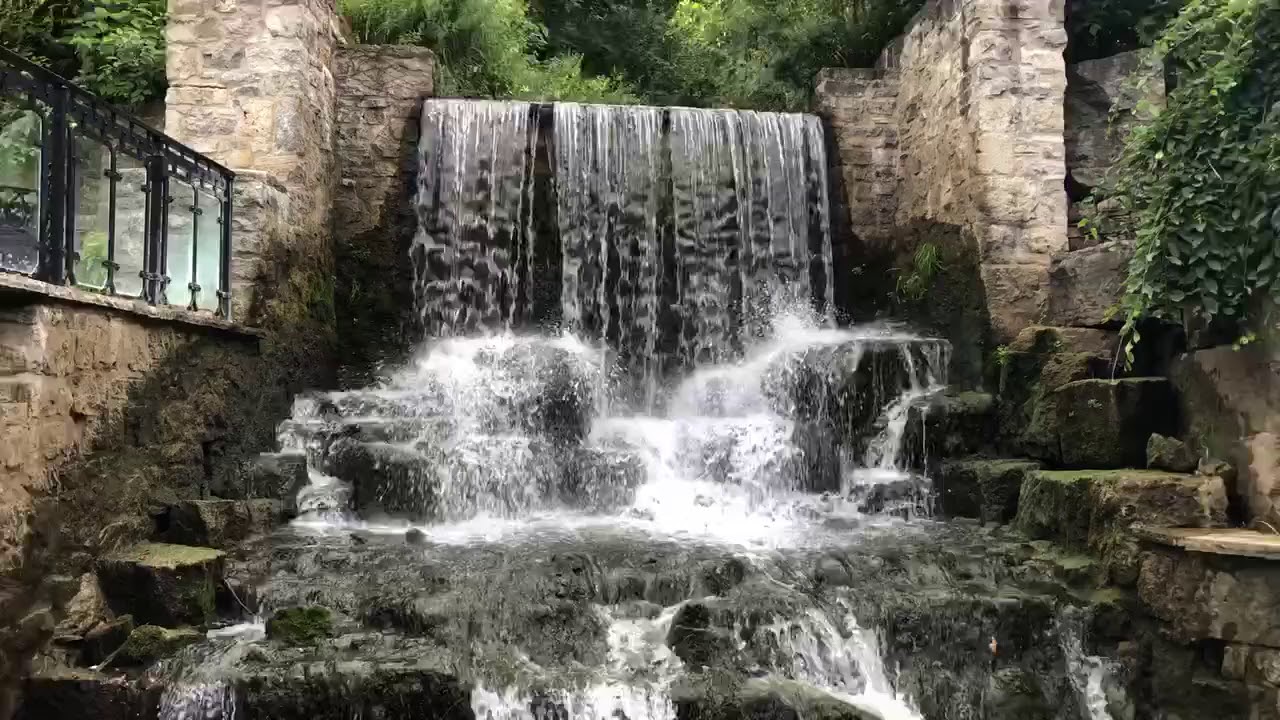 Beautiful Ancaster old mill waterfalls - upper view. Relaxing visit and ...