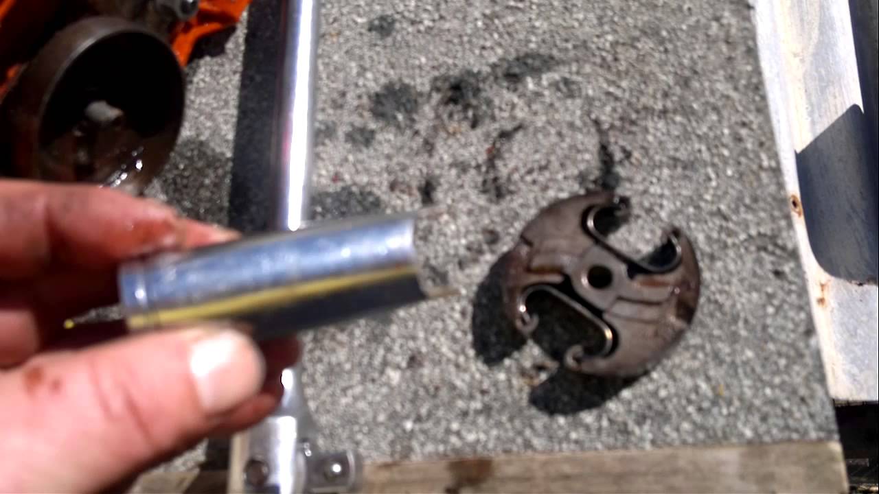 husqvarna chainsaw clutch removal tool - YouTube