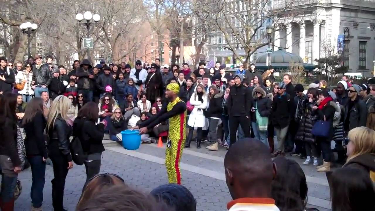 Street performer doing his "stunt" in Union Square, NYC. - YouTube