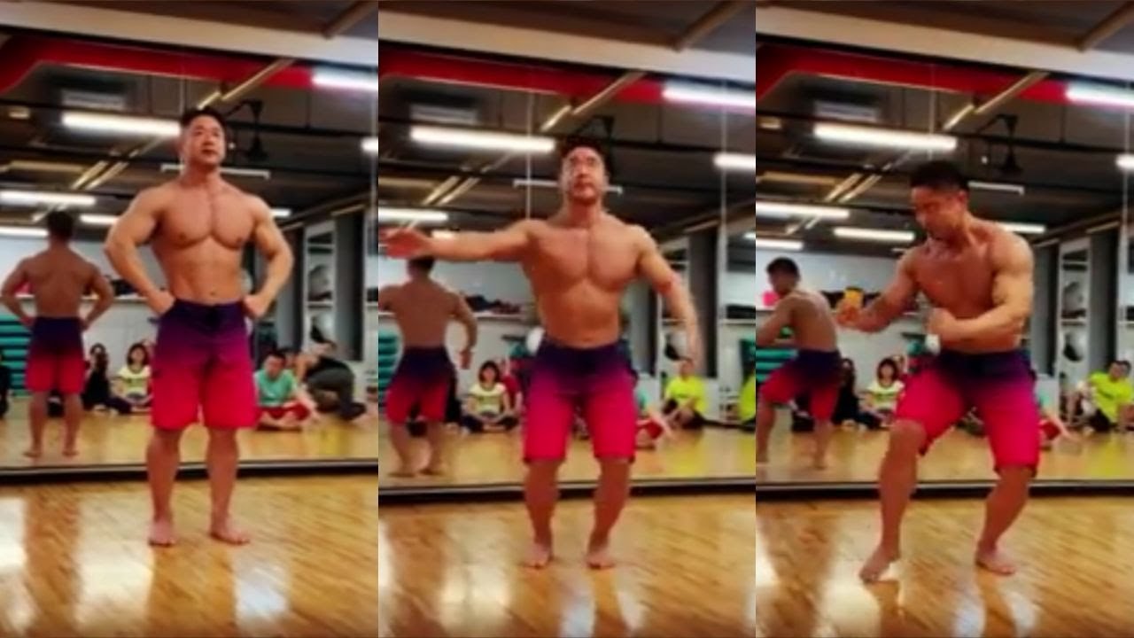 Japan Bodybuilder Dances Hawaiian Dance - YouTube