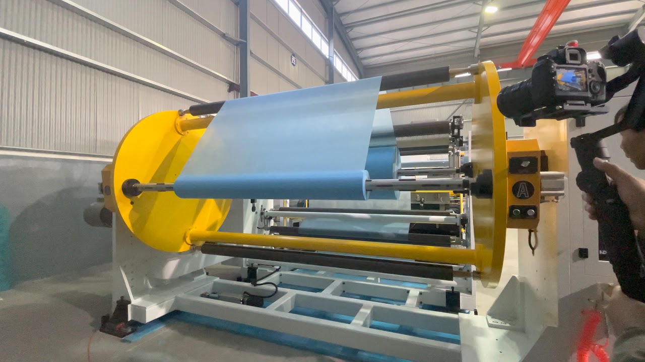 NDC NTH2600 Nonwoven+PE film lamination machine turret unwind double ...