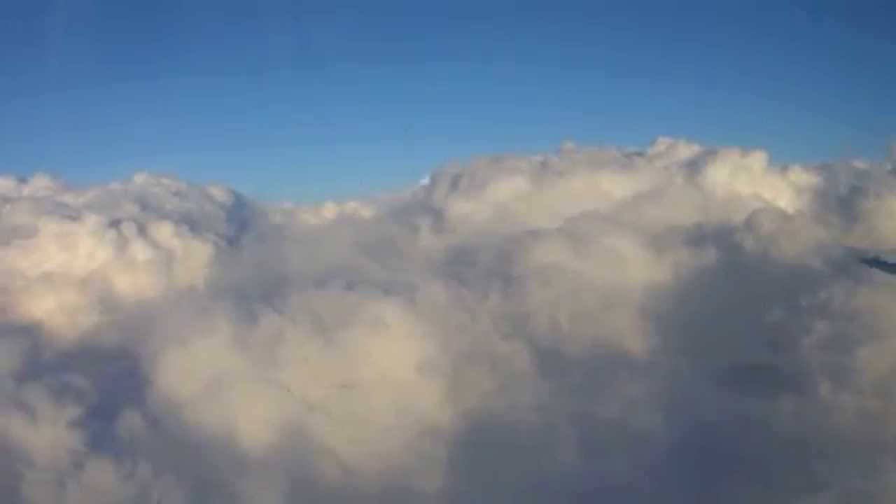 Flying out of Atlanta, beautiful cumulus clouds, and the airplanes ...