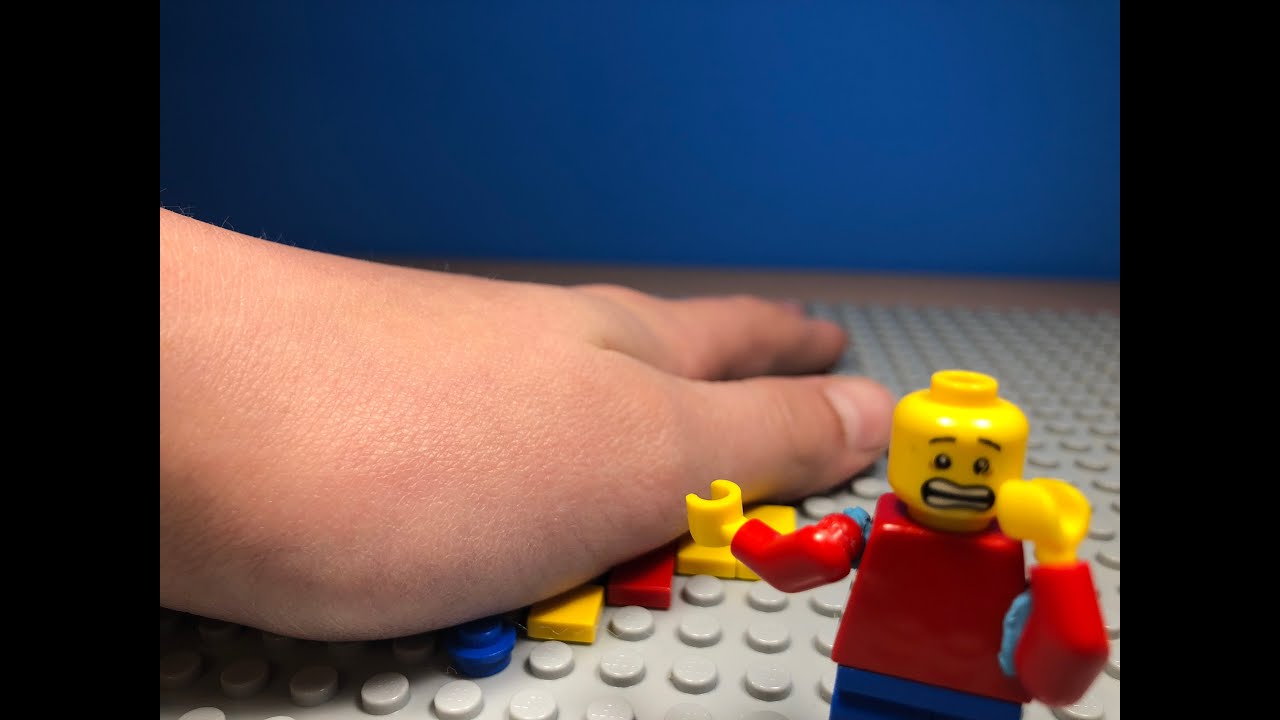 Lego Man gets smashed by a big hand - YouTube