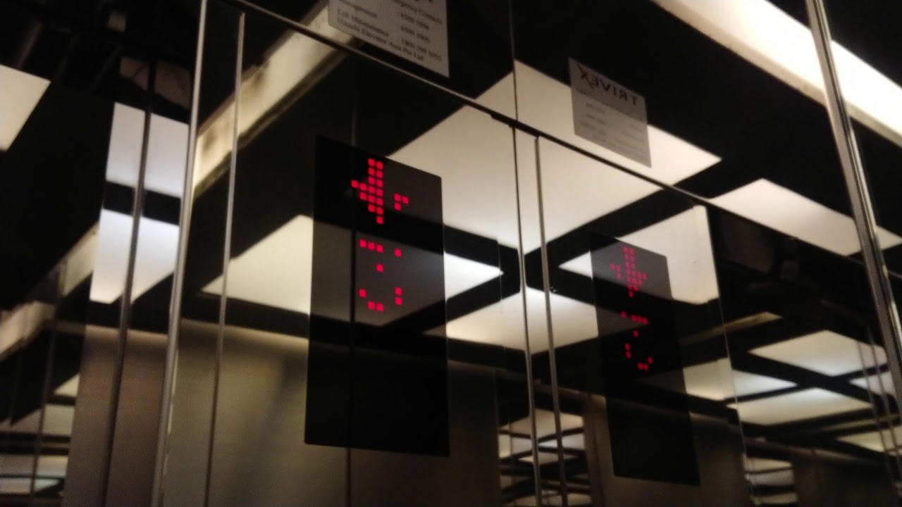 [4K30] Ride on Hitachi Traction Elevator at Trivex Building Tai Seng ...