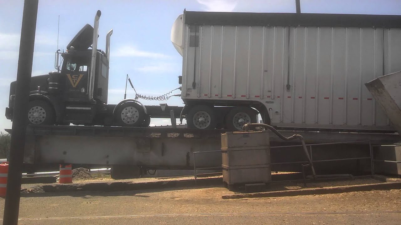 Emptying out a wood chip truck - YouTube