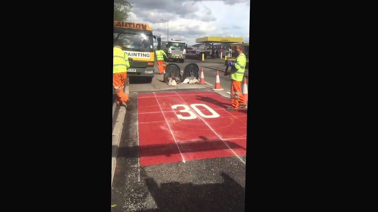 30mph roadmarkings painted on Red Antiskid Surfacing.....A1 Streamline ...