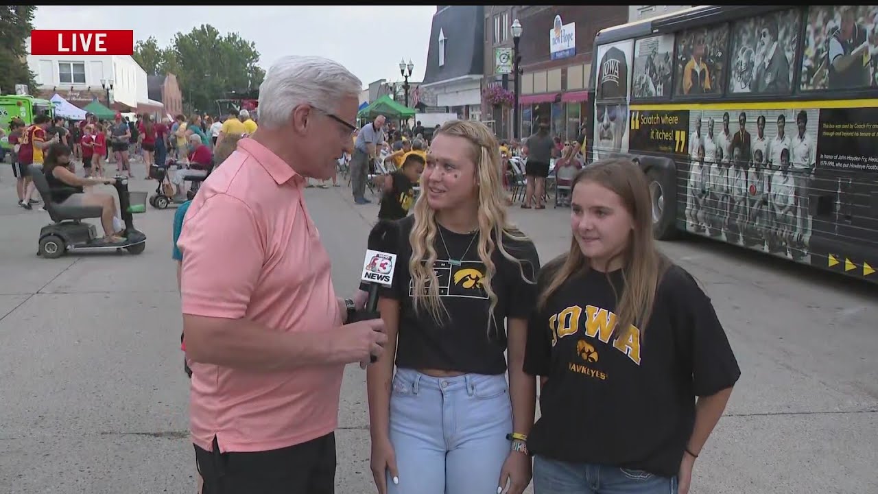 Ed Wilson talks to two Hawkeye fans in Jefferson at RVTV - YouTube