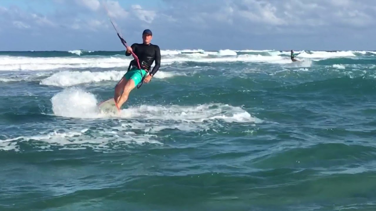 How to do a kite loop backroll transition on a surfboard - YouTube