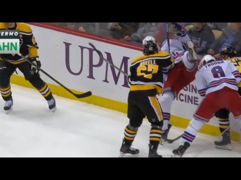 Rickard Rakell Hits Filip Chytil