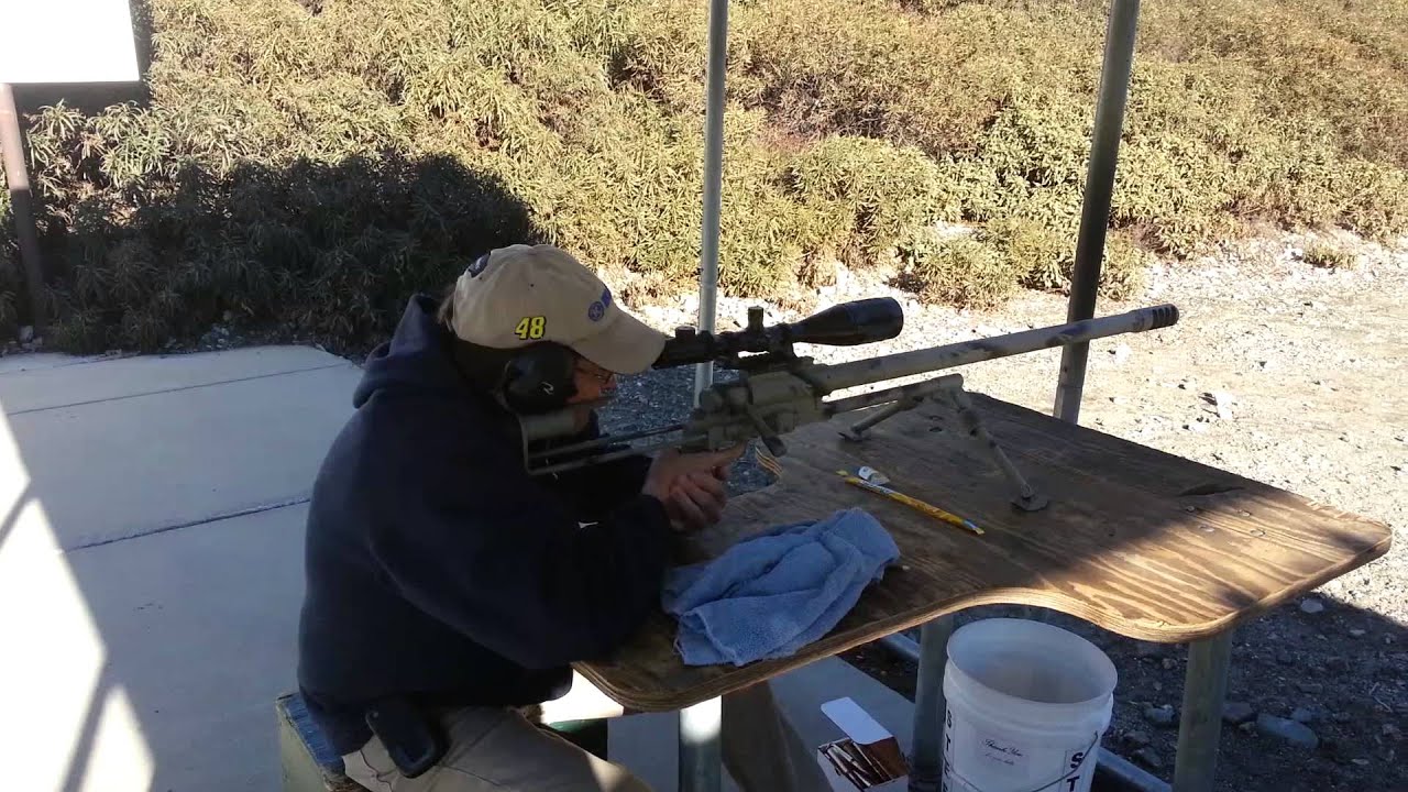 Man shoots 50cal. and blows his hat off - YouTube