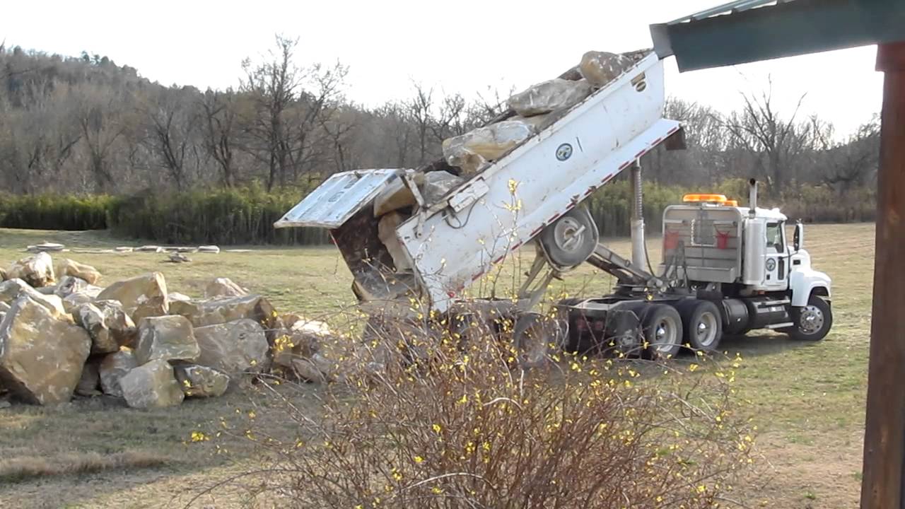 BIG rocks being dumped - YouTube