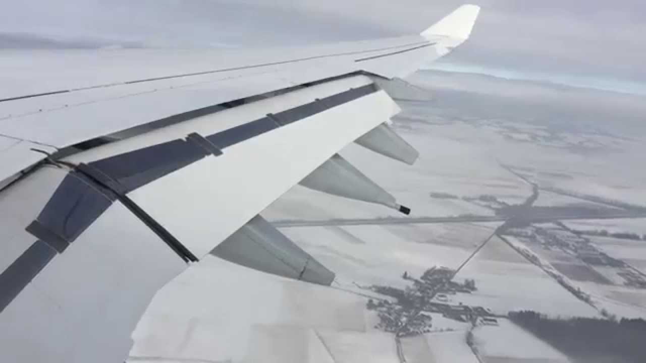 Lufthansa Airbus A340-600 landing into Munich MUN - Wing and Flap View ...