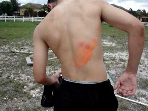 getting shot by a paintball gun - YouTube