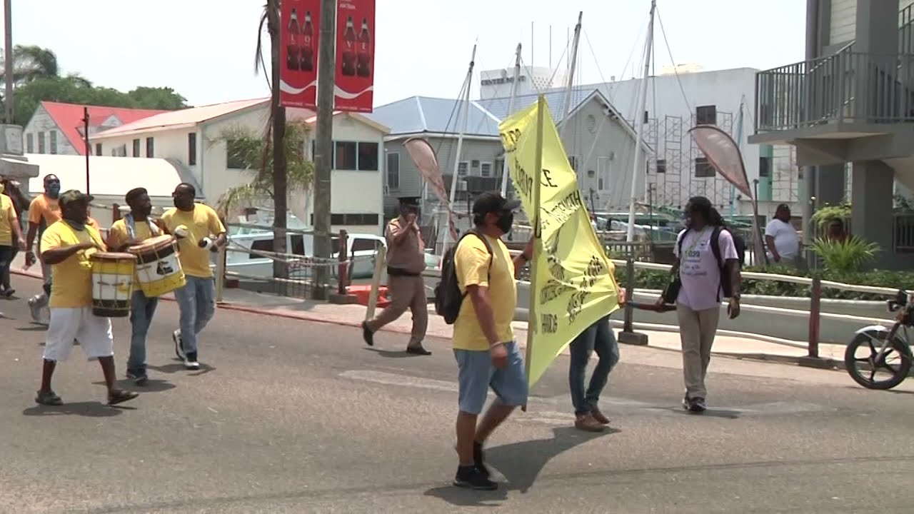 Unions March Through Belize City - YouTube