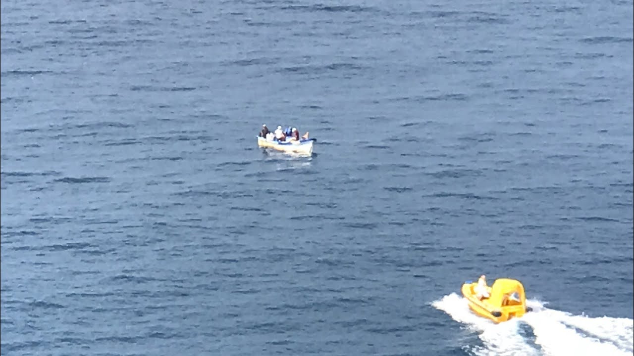 A Royal Caribbean Ship Rescues Men Stranded at Sea - YouTube