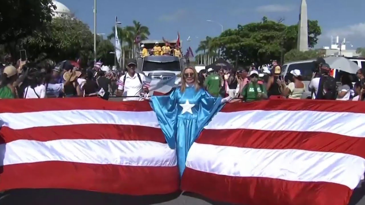 Thousands celebrate at first-ever Puerto Rican parade in San Juan - YouTube