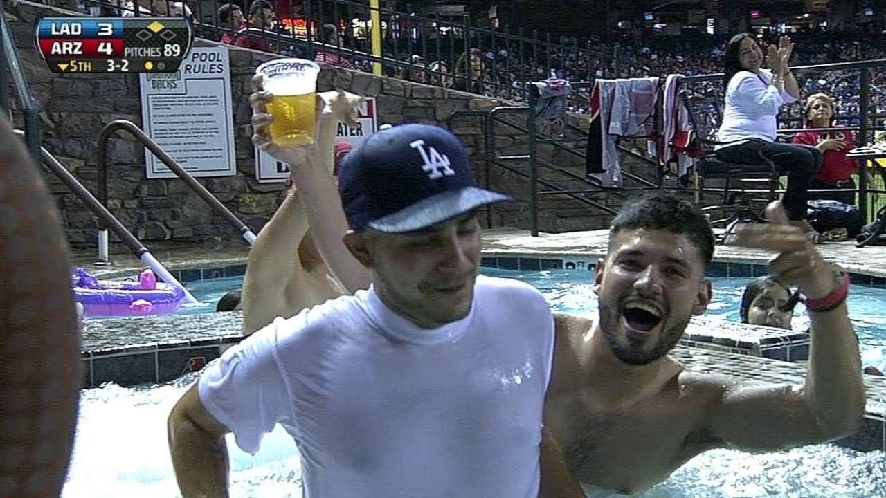 Dodger fan gets pushed in the pool - YouTube