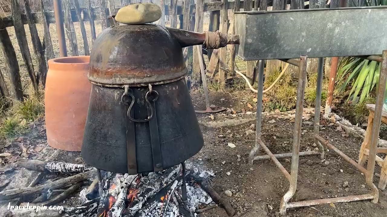Making the Georgian alcoholic drink "Tchatcha" by a traditional method ...