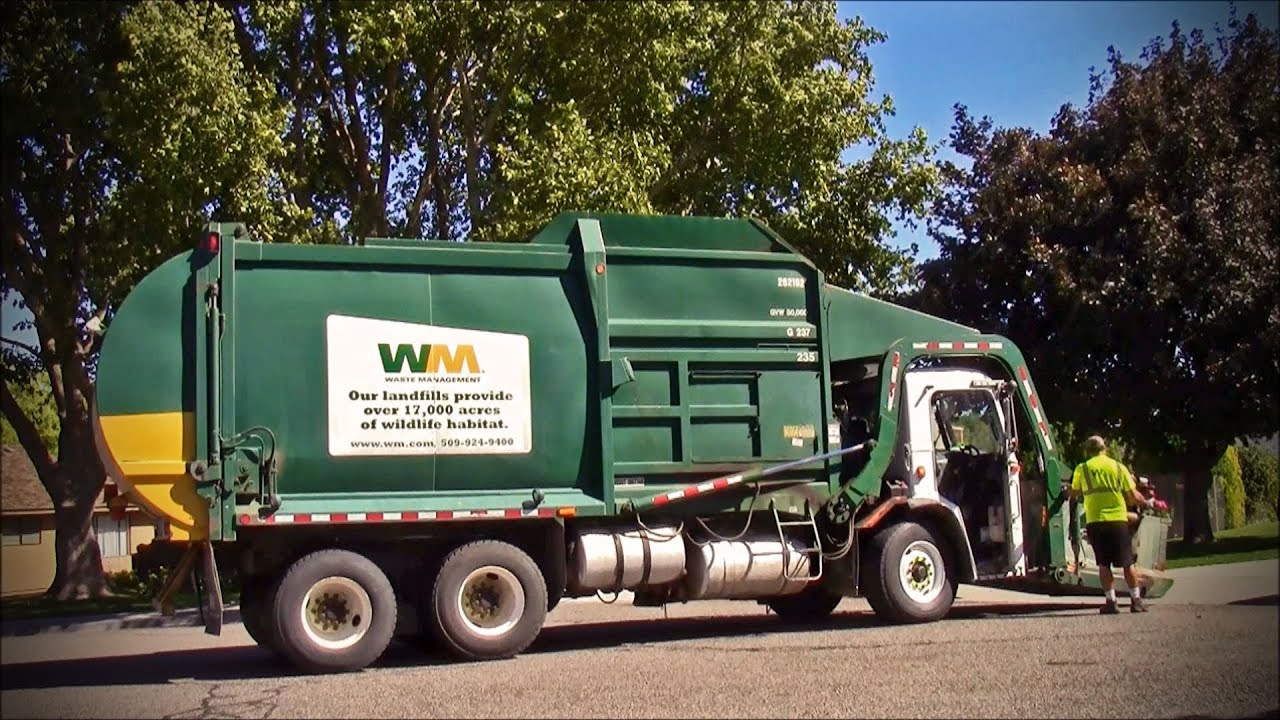 Peterbilt 320 Wittke Starlight Garbage Truck with Carry Can - YouTube