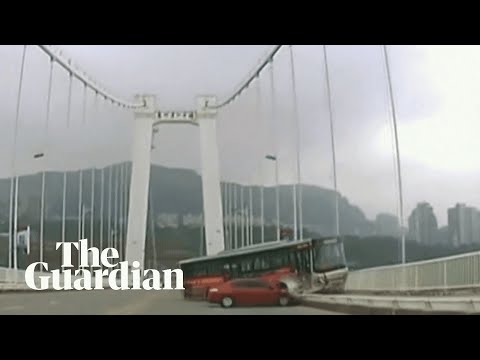 Bus careers off bridge in China as driver and passenger fight