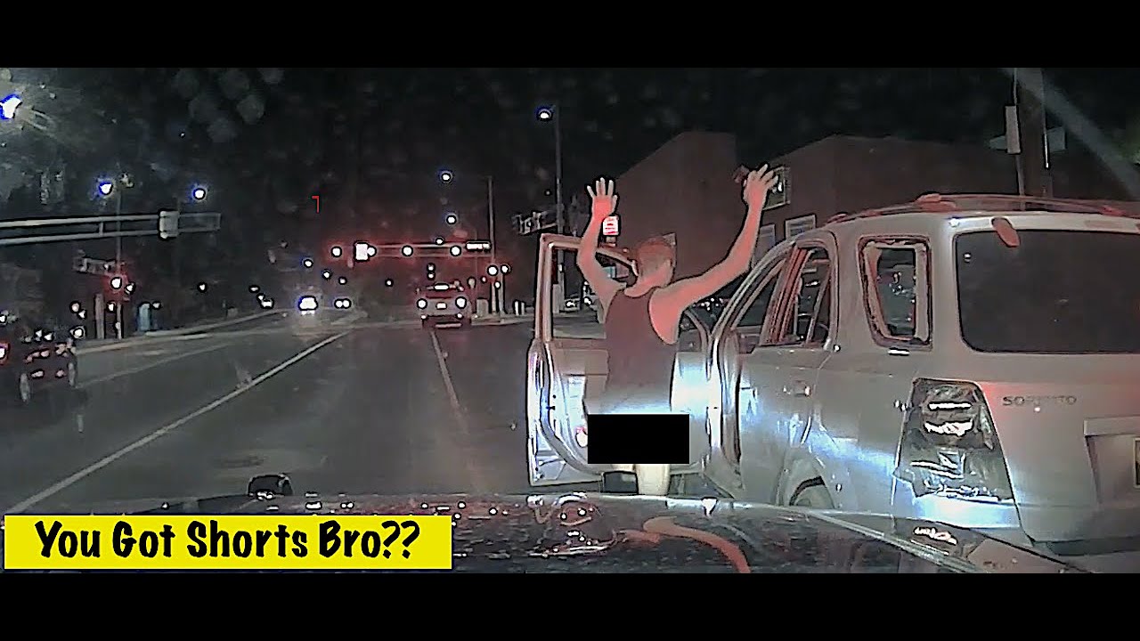 Dash Cam Catches Police Chasing Bizzare Half Naked Suspected Burglar