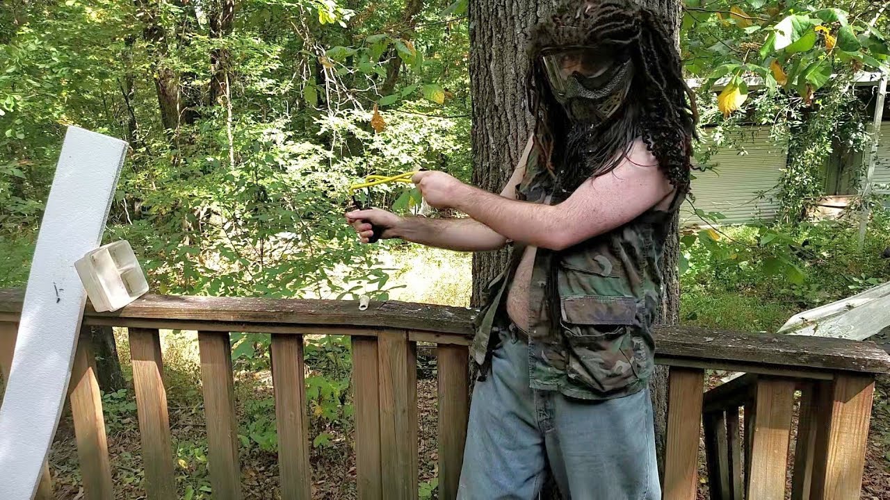 bone slingshot ammo vs plastic container - YouTube